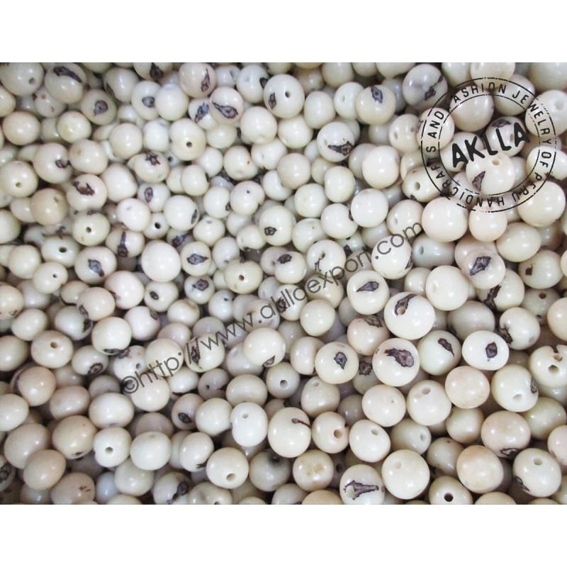 500 grams of Polished and Drilled Acai Seeds | AKLLA EXPORT